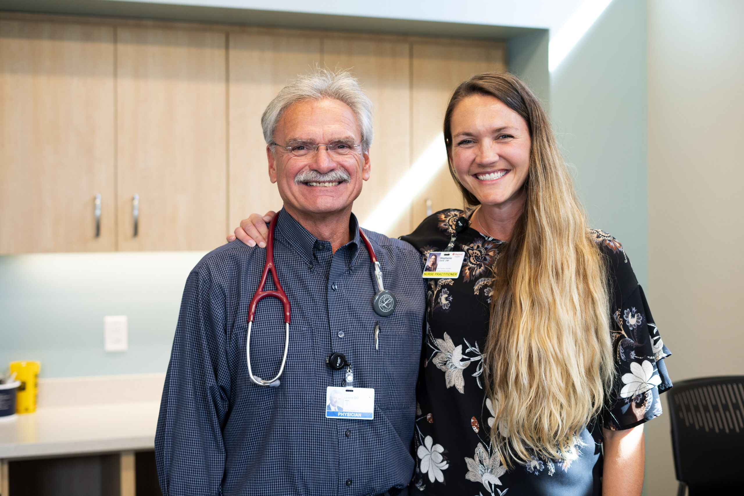 Practitioner works alongside physician who delivered her